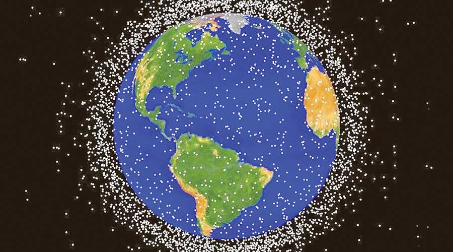Earth is 'on course' to have its own Saturn-like rings made of space ...